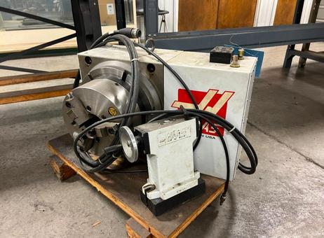 2003 HAAS HRT-310 ротациони сто са 4. осом и 10" 3-чаурни стезаљком