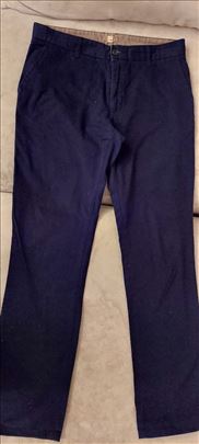 Crne Koton pantalone 32