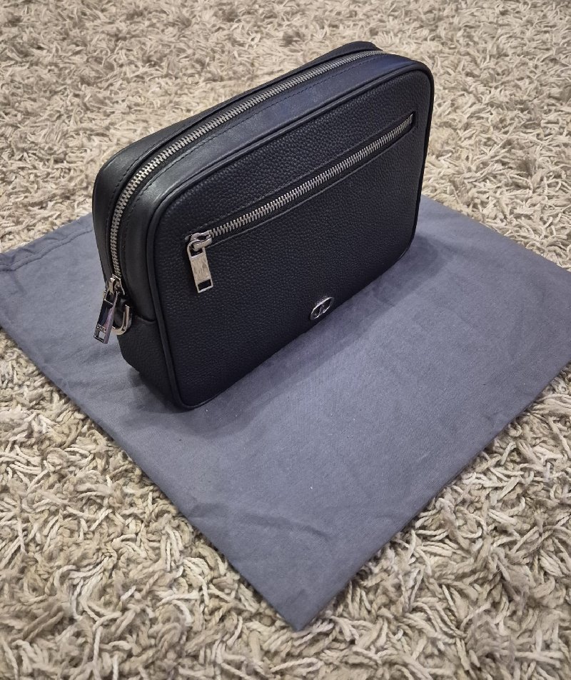 Kozna torbica Cristian Dior
