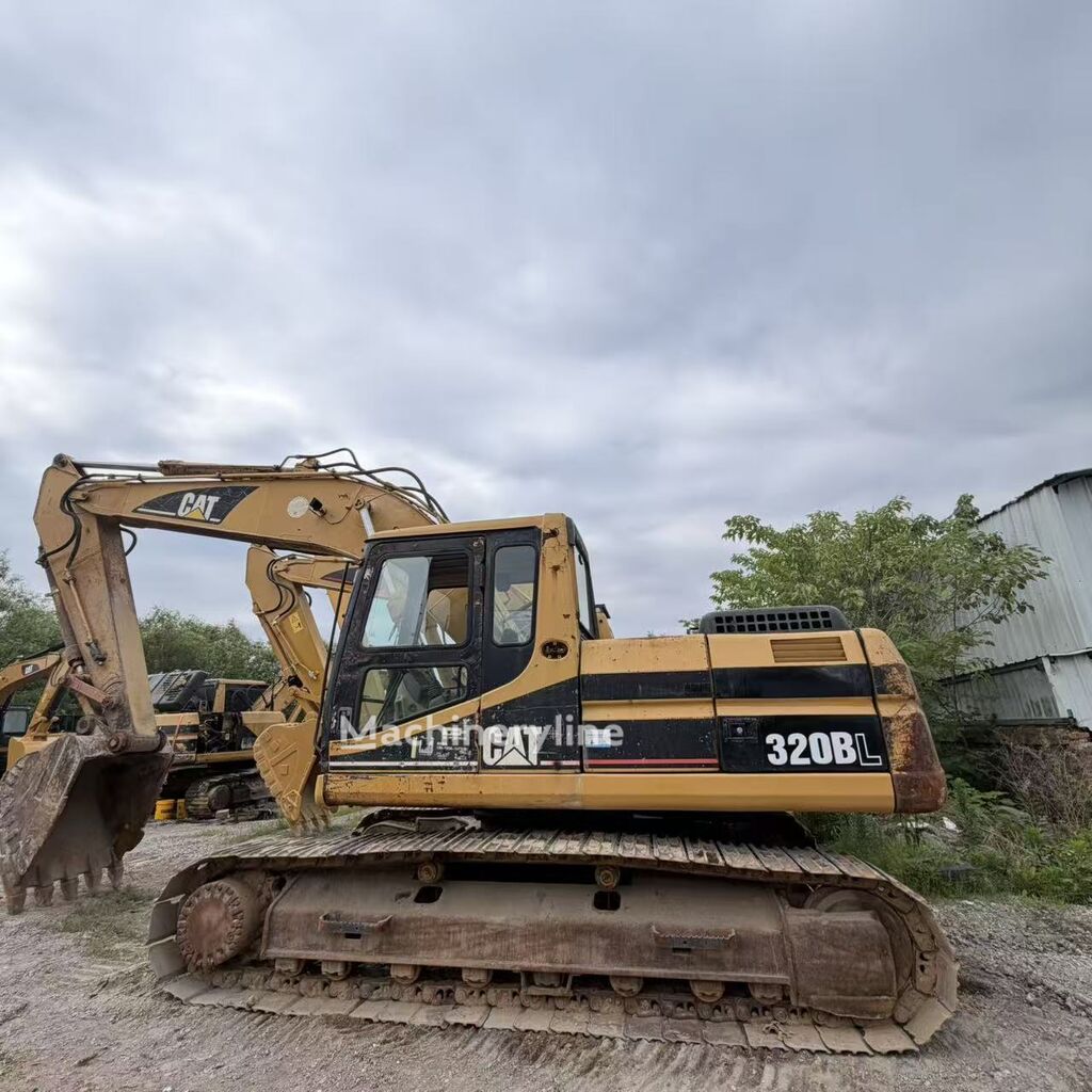 Caterpillar 320BL bager guseničar