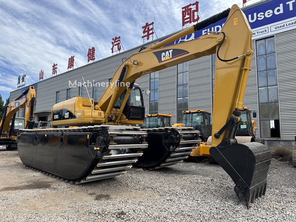 Caterpillar 320C bager amfibija