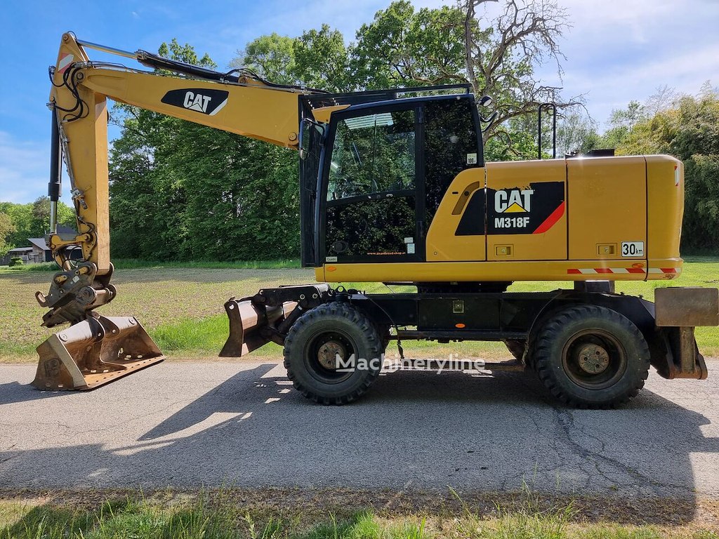 Caterpillar M 318 F bager točkaš
