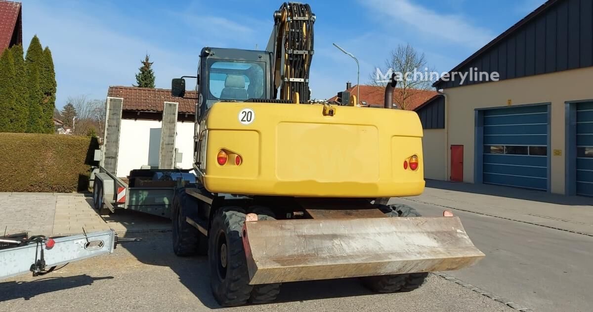 Caterpillar M313D bager točkaš