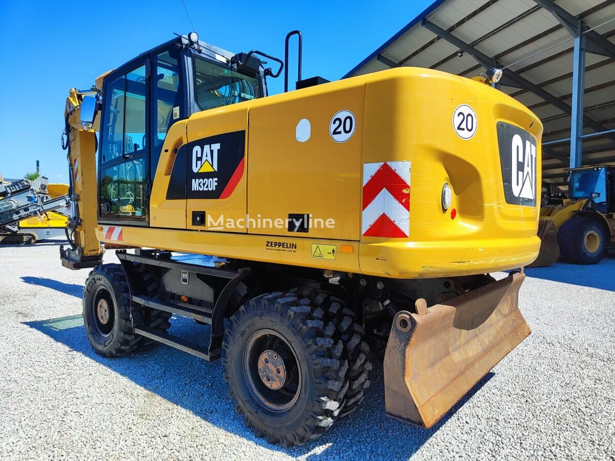 Caterpillar M320F bager točkaš