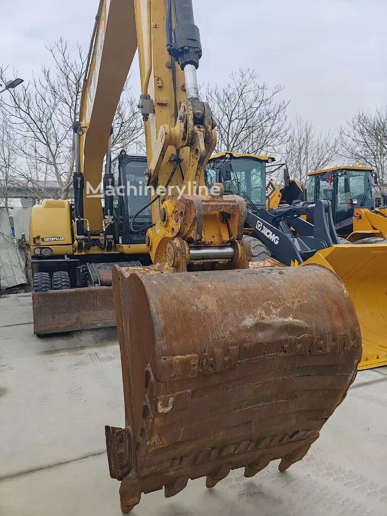 Caterpillar 320D bager točkaš