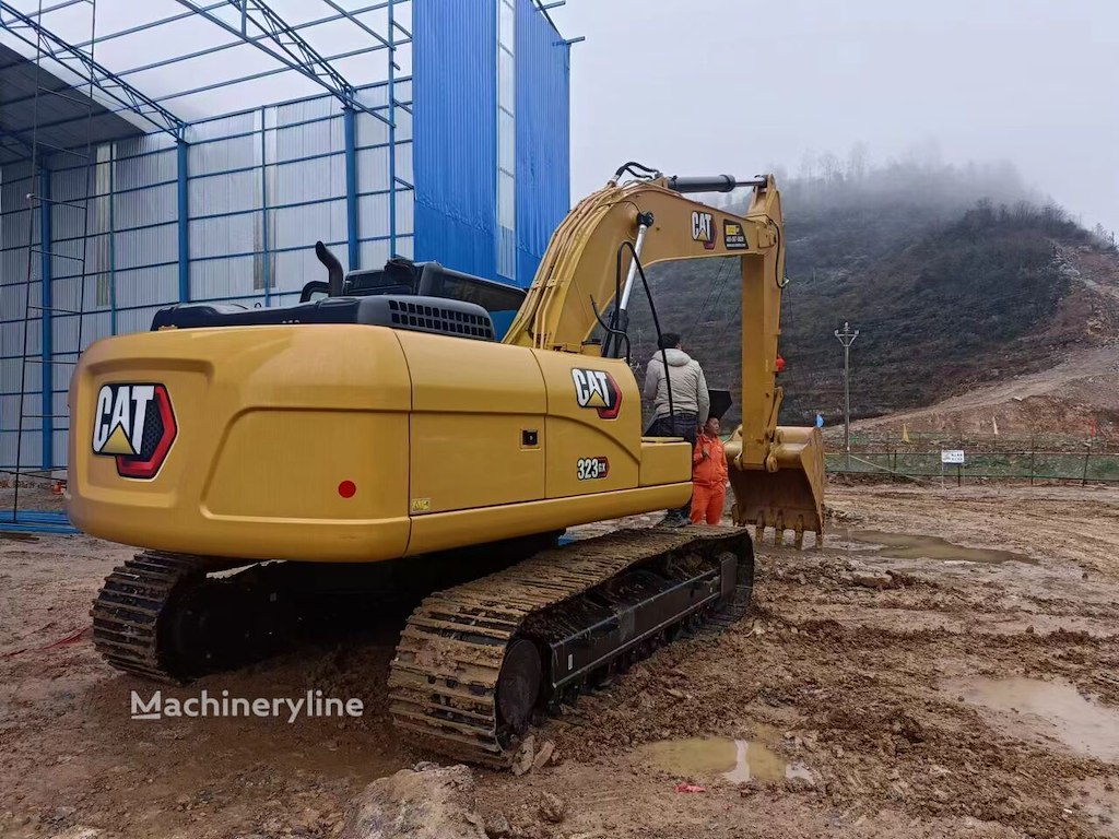 Novi Caterpillar 323GX bager guseničar
