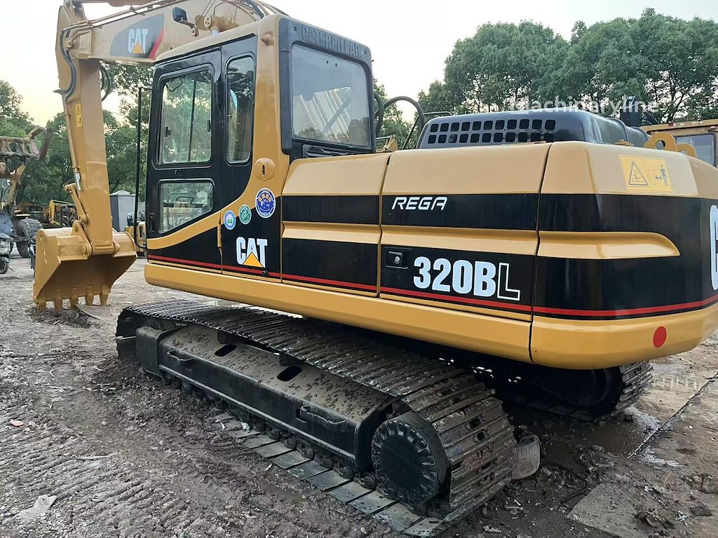 Caterpillar 320BL bager guseničar