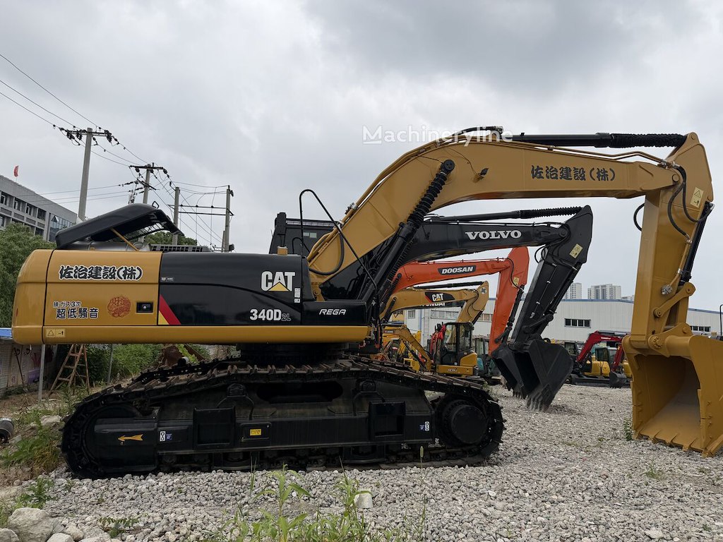 Caterpillar 340DL bager guseničar