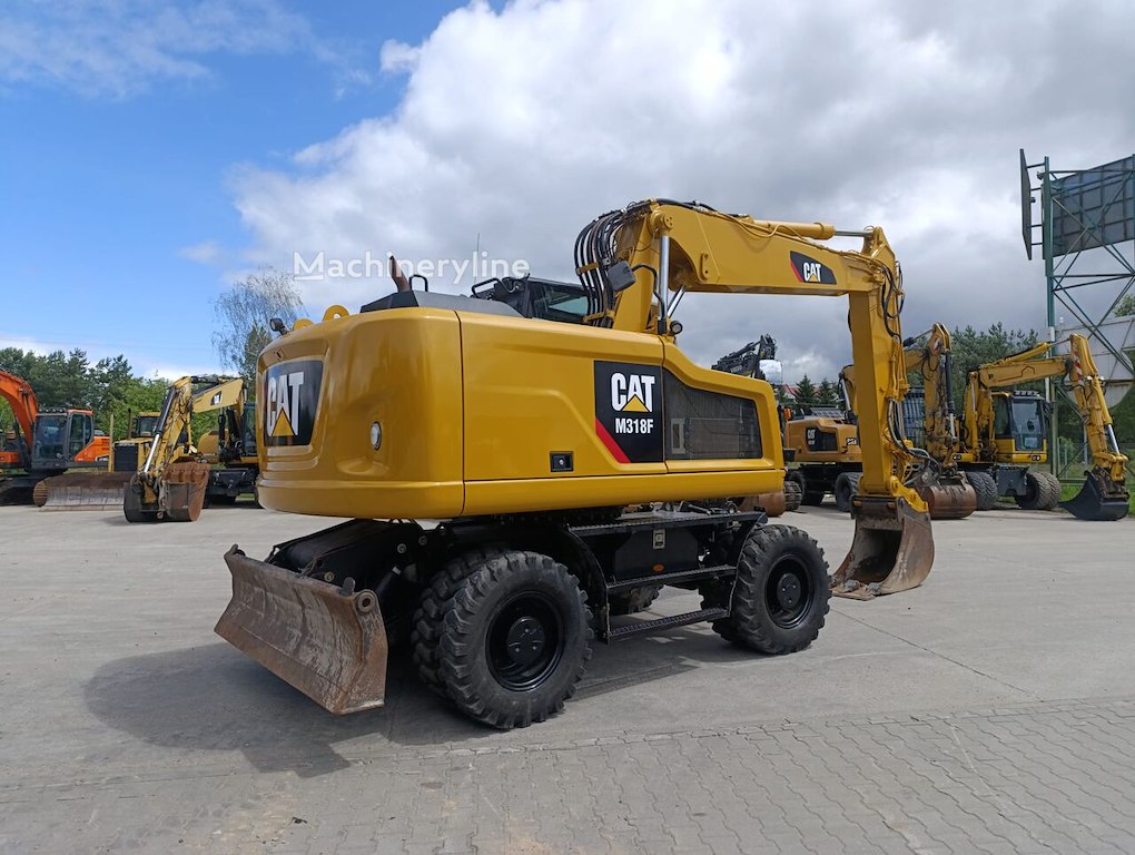 Caterpillar M318F bager točkaš