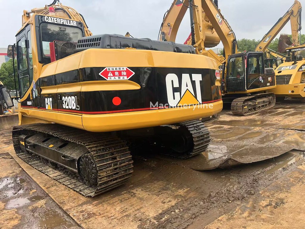 Caterpillar 320BL bager guseničar