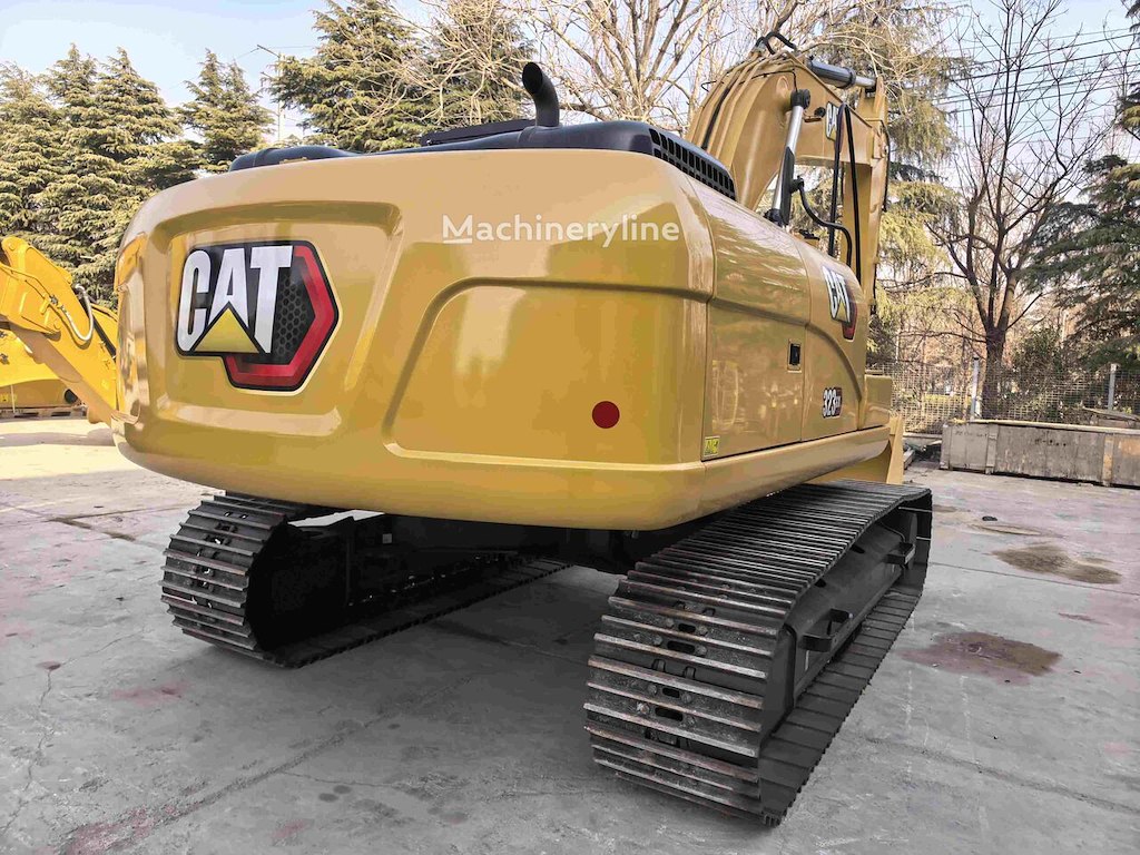 Caterpillar 323GX bager guseničar