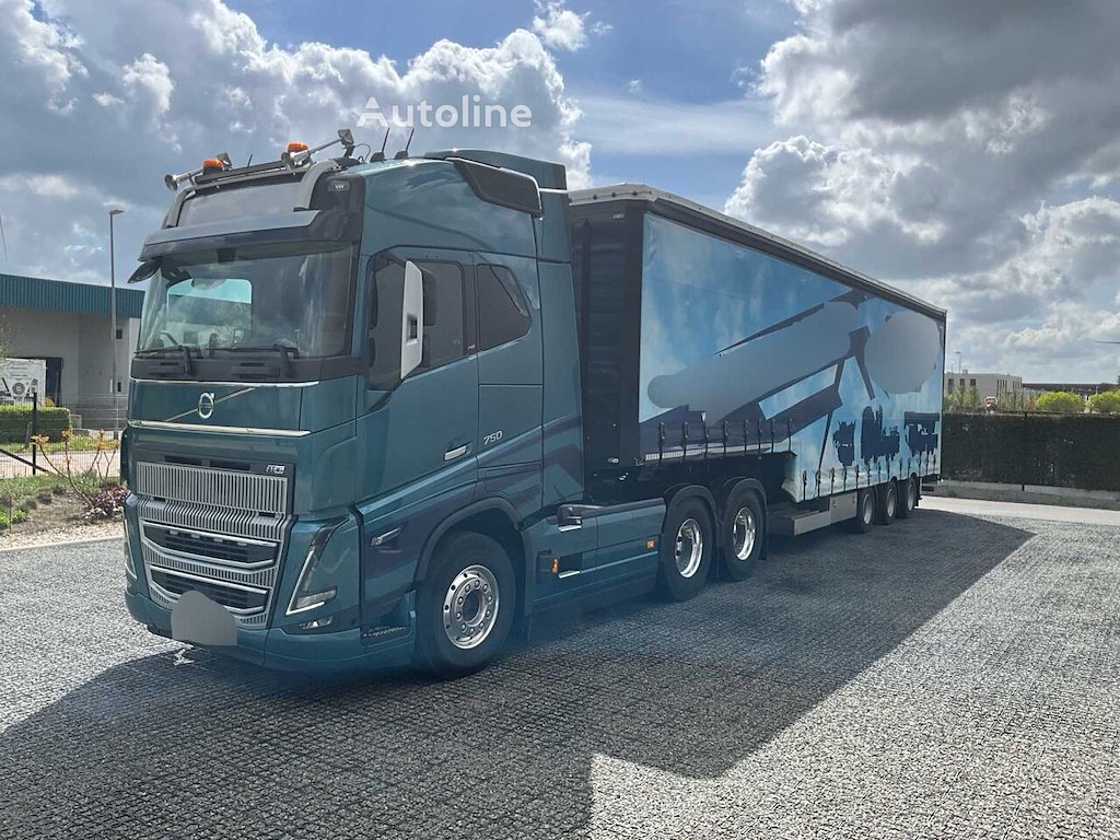 Prodaje se Volvo FH16 tegljač na aukciji + poluprikolica sa kliznom ceradom
