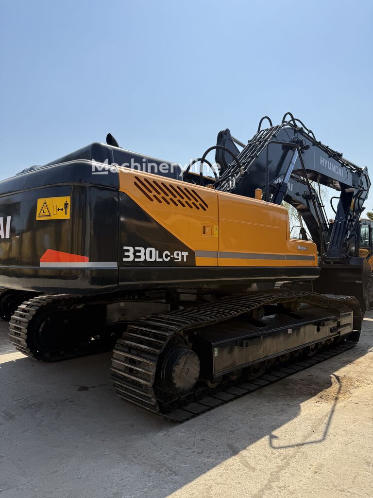 Hyundai Robex 330 bager guseničar