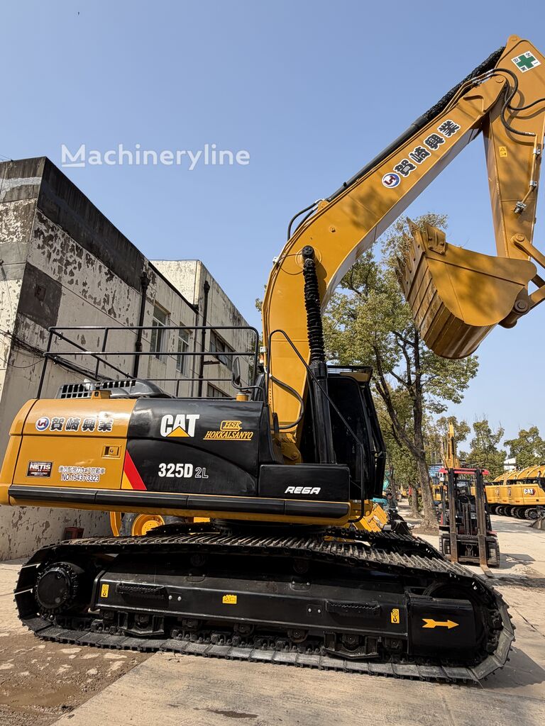 Caterpillar 325DL bager guseničar