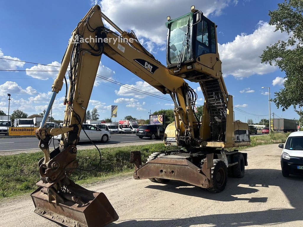 Caterpillar M318C emelhető fülkés 13 500 000 Ft + ÁFA Bruttó: 17 145 000 Ft bager za pretovar