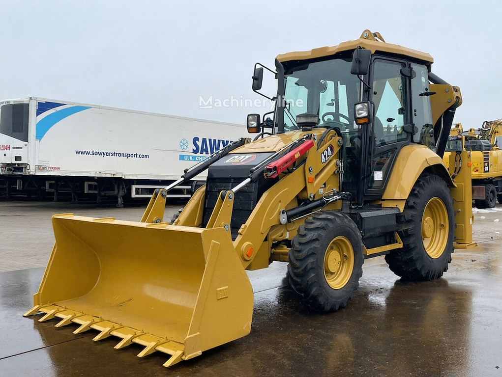 Novi Caterpillar 424 bager-utovarivač