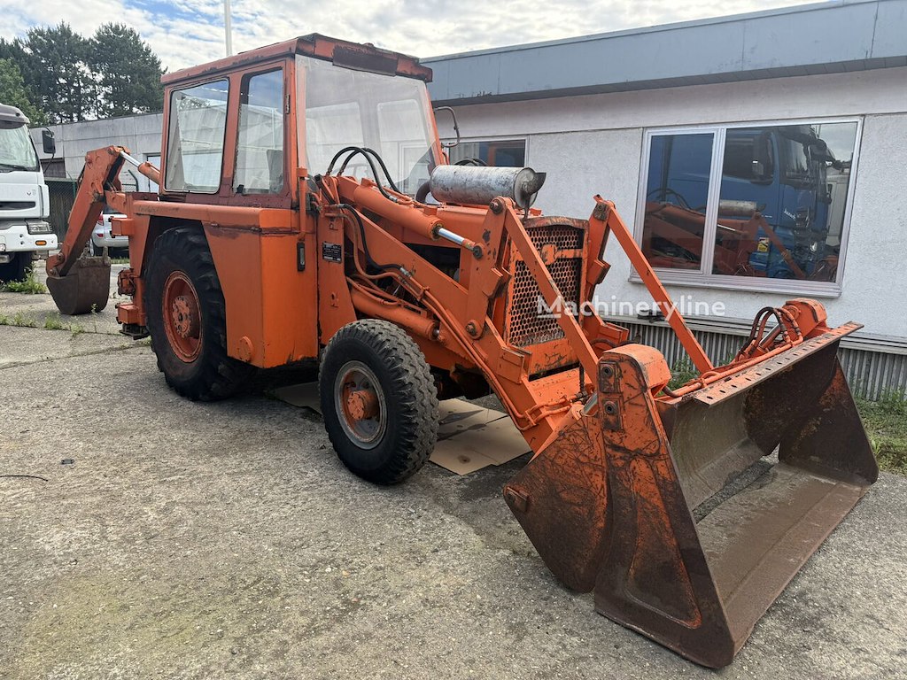 Benati bager-utovarivač