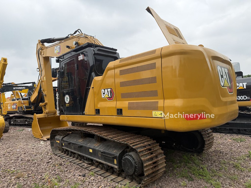 Caterpillar 330 bager guseničar