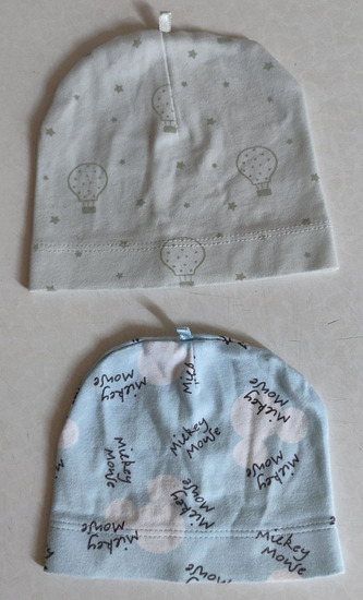 Nove pamučne kapice za bebe 6-9 m (Disney & LCW)