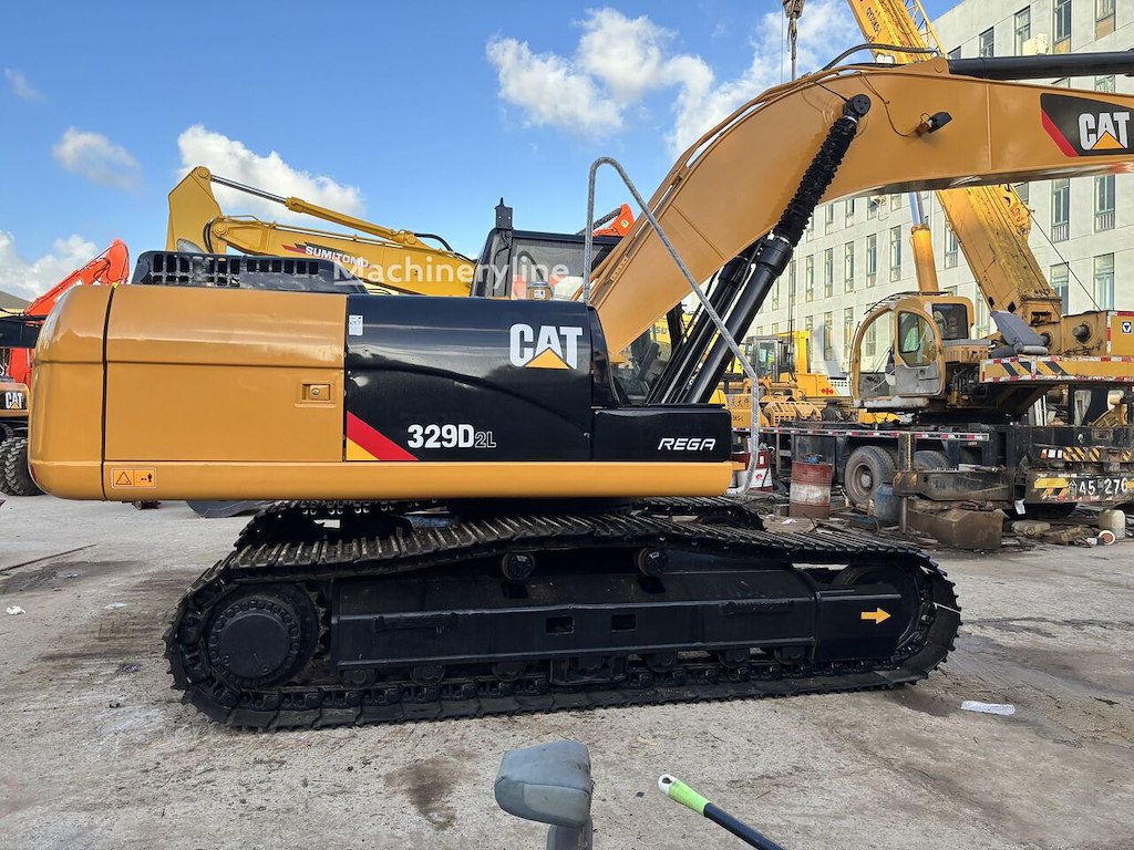 Caterpillar 329 bager guseničar