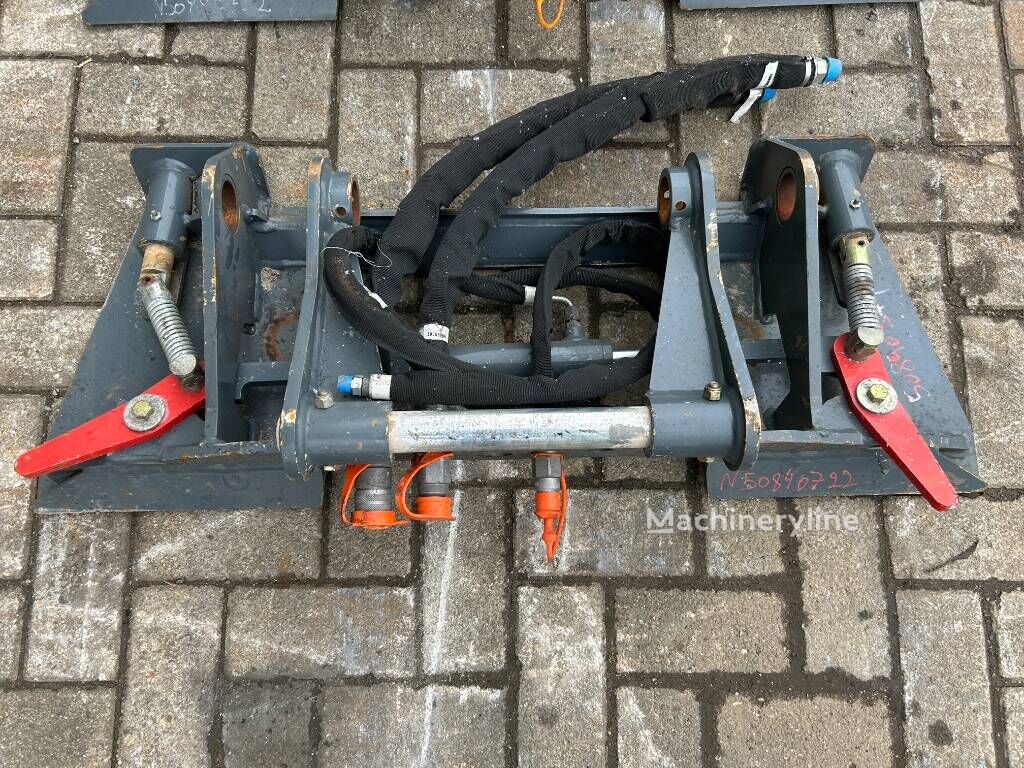 Bobcat Mustang,Case,Tomas brza spojnica za građevinske mašine