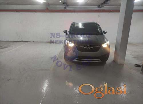 Garazno mesto u suterenu zgrade na Telepu, 15m2