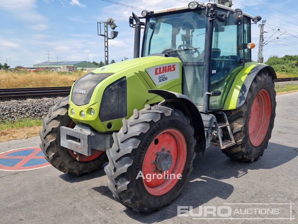 Prodaje se Claas Axos 340 traktor točkaš na aukciji