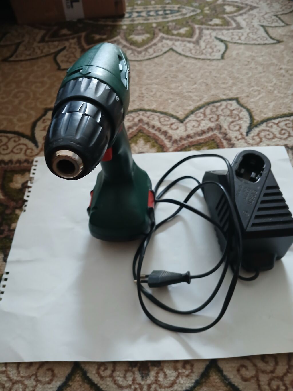 Bosch PSR 1200 bežična bušilica/odvijač sa punjačem i baterijom. -