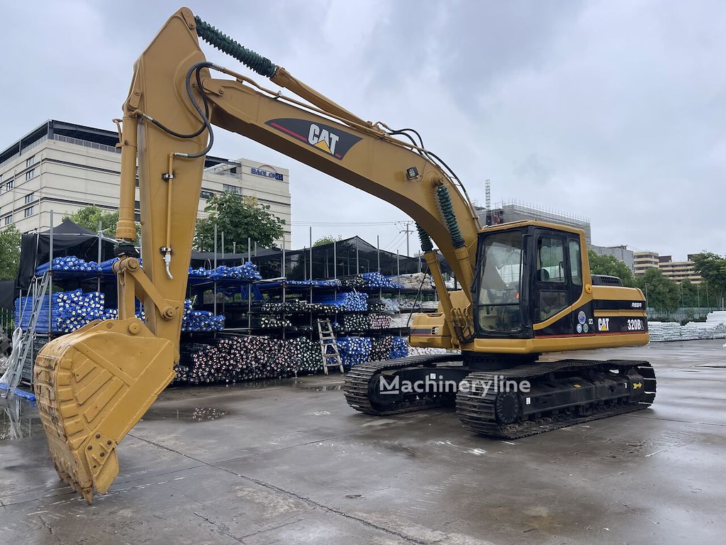 Caterpillar 320BL bager guseničar