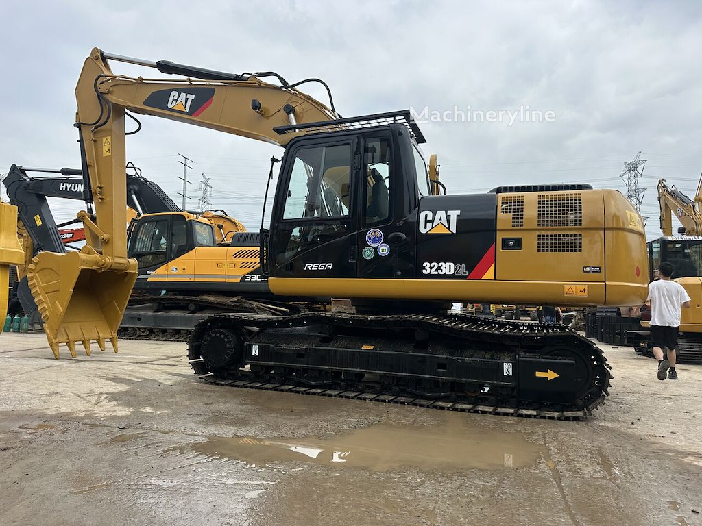 Caterpillar 323D bager guseničar