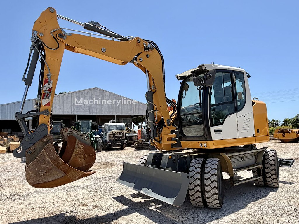 Liebherr A910 bager točkaš