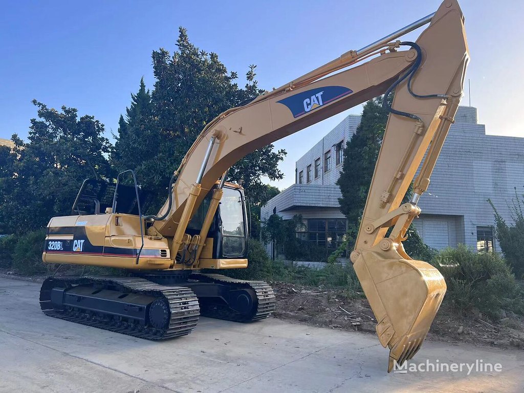 Caterpillar 320BL bager guseničar