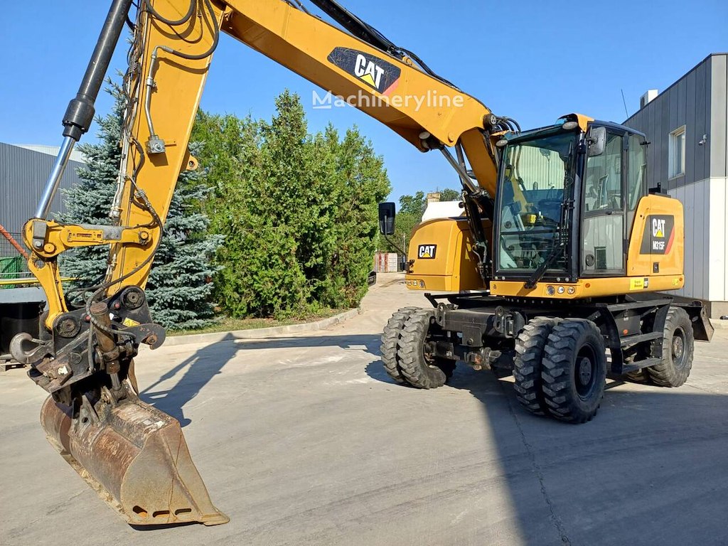 Caterpillar M315F bager točkaš