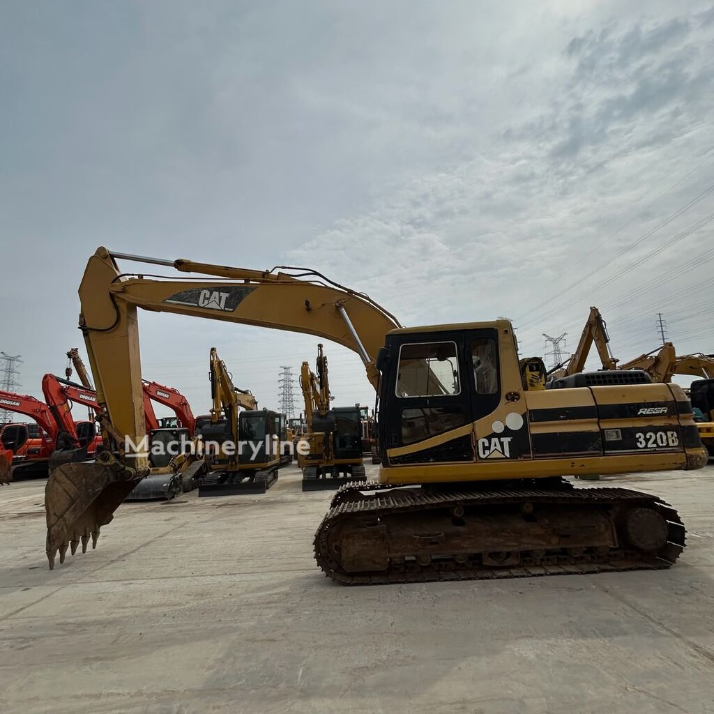 Caterpillar 320BL bager guseničar