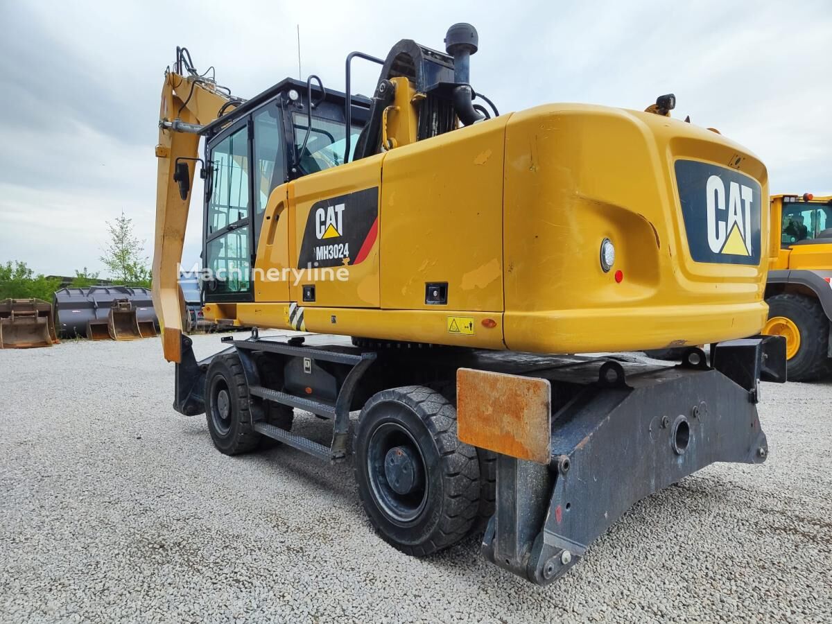 Caterpillar MH3024 bager za pretovar
