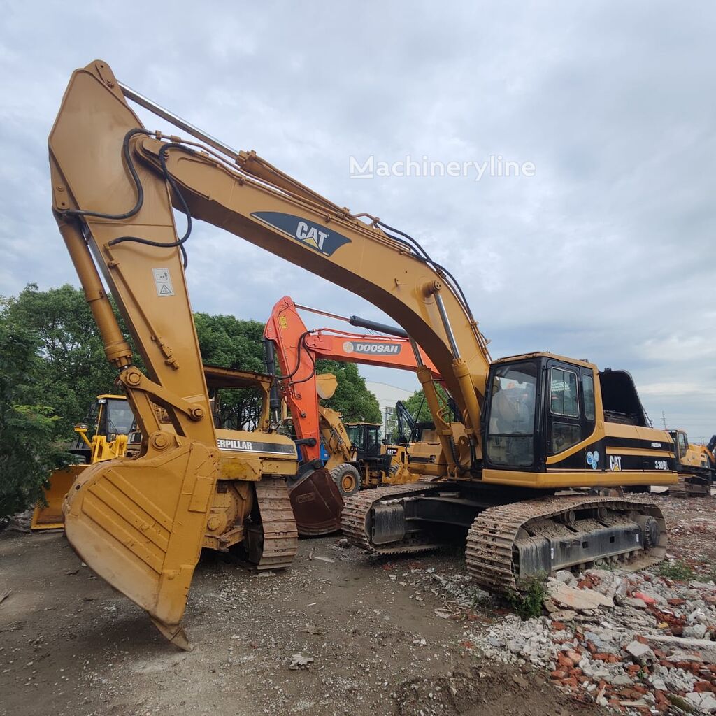 Caterpillar 330BL bager guseničar