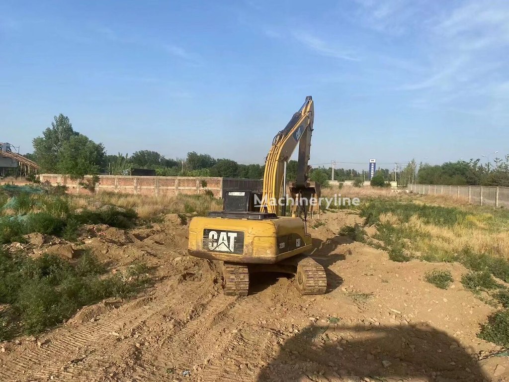 Caterpillar bager guseničar