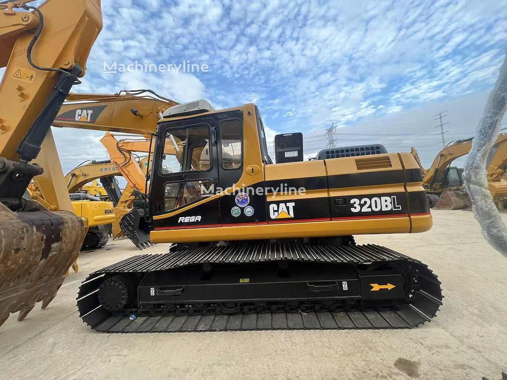Caterpillar 320BL bager guseničar