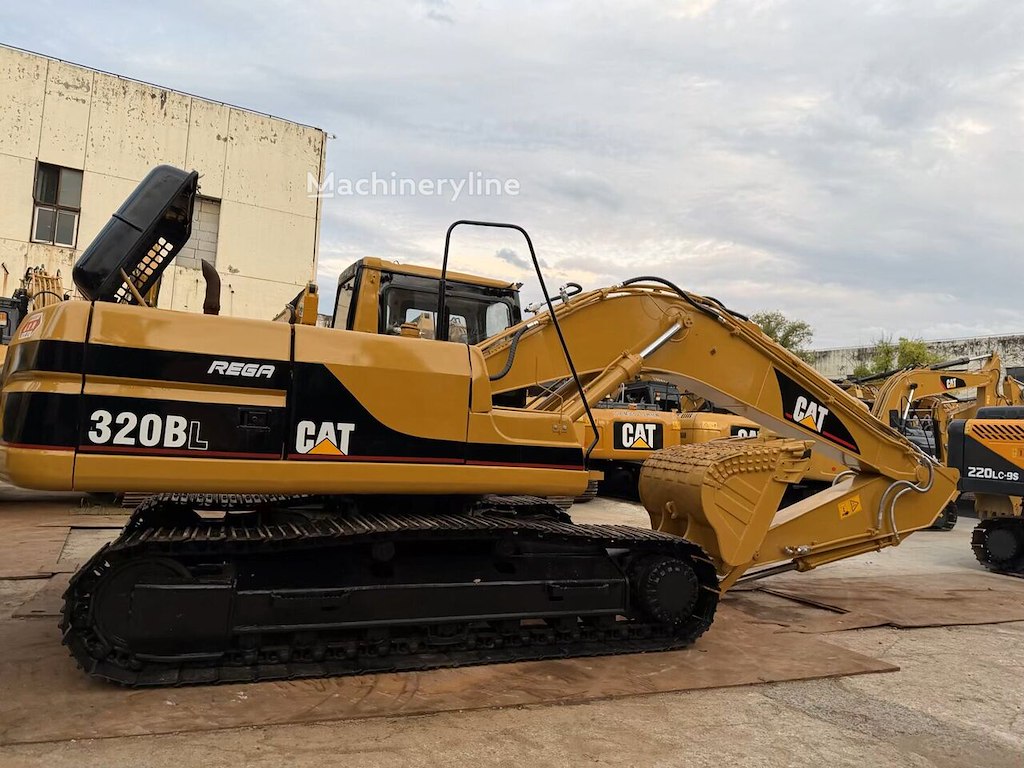 Caterpillar 320BL bager guseničar