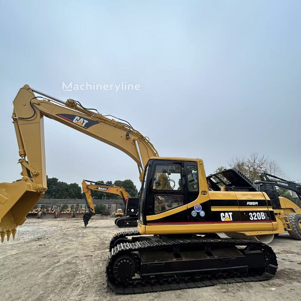 Caterpillar 320B bager guseničar