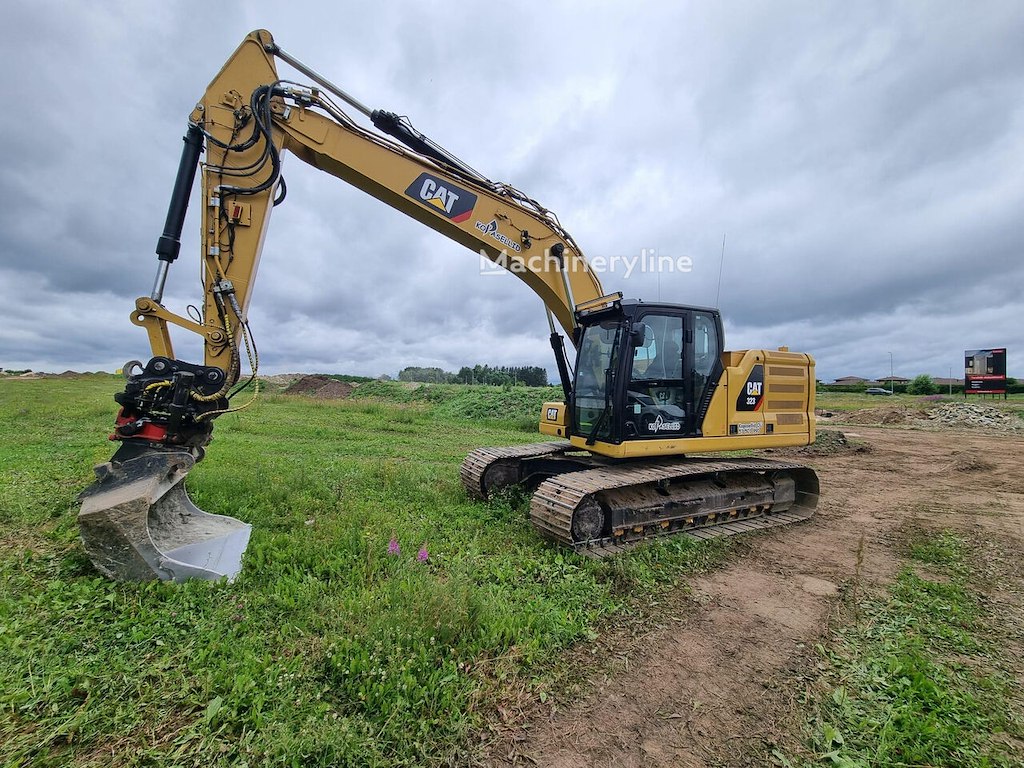 Caterpillar 323 bager guseničar
