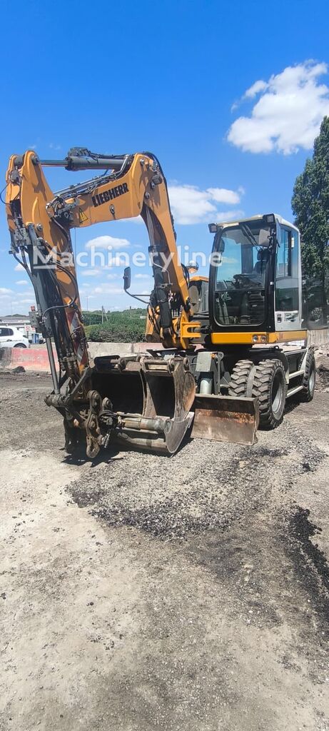 Liebherr A910 bager točkaš