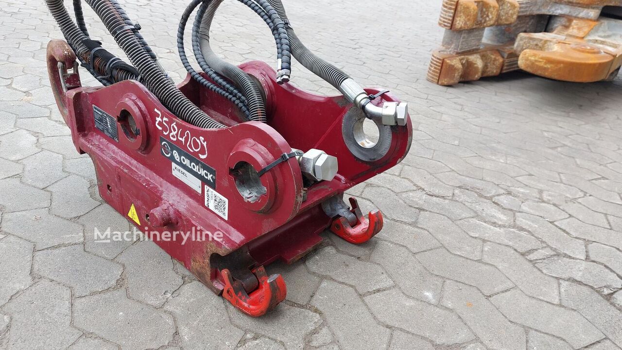 OilQuick OQ65 brza spojnica za Fuchs MHL320 bagera