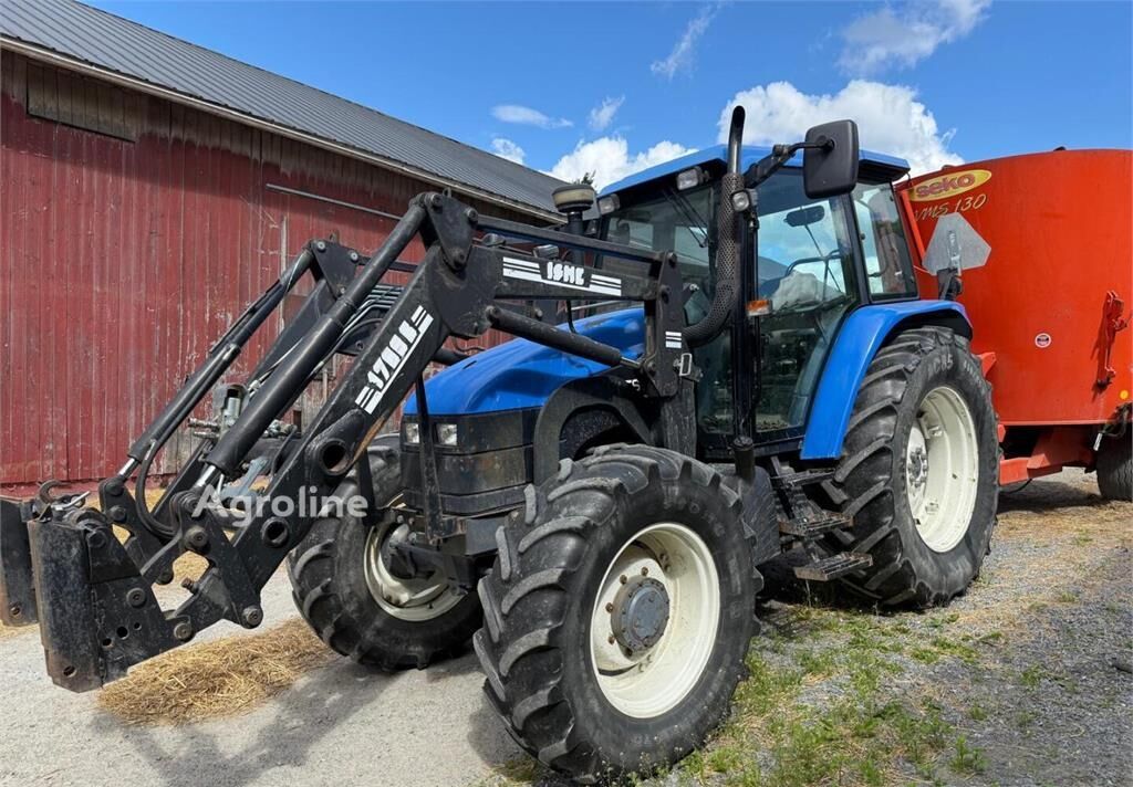 New Holland TS115 traktor točkaš