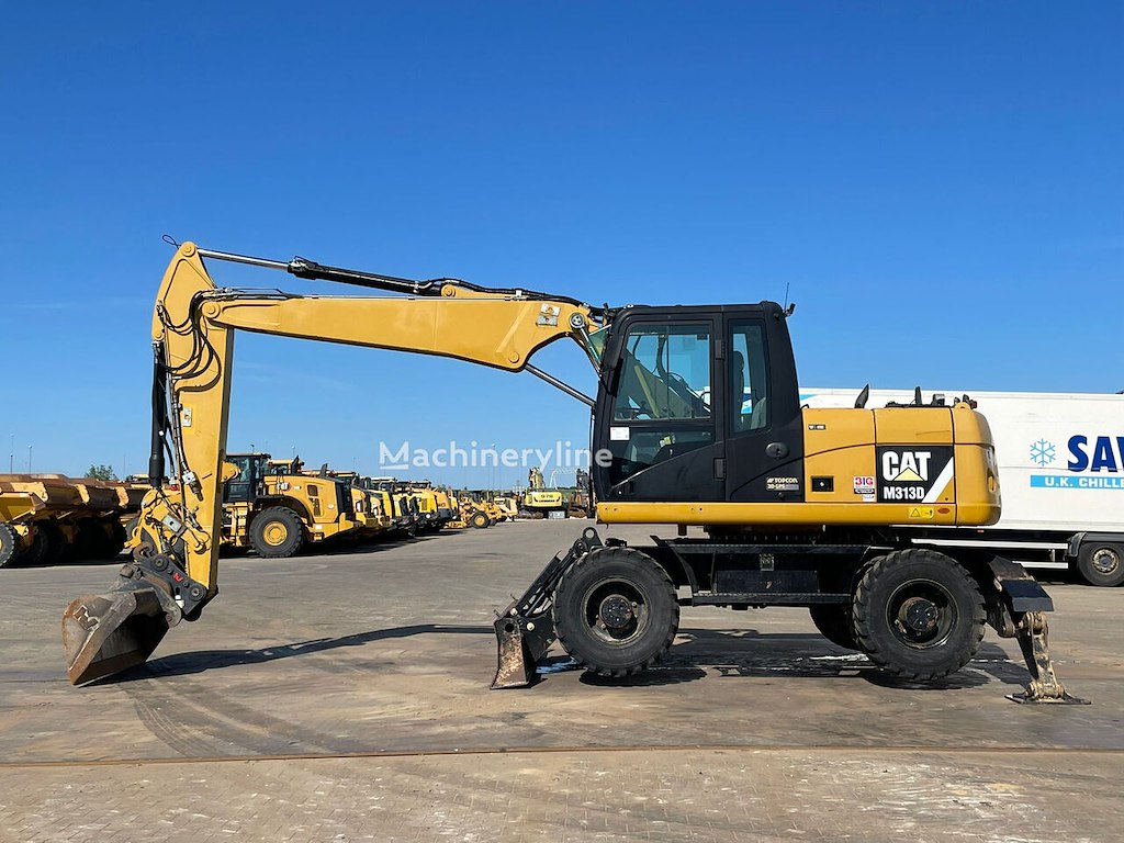 Caterpillar M313D VA - Outriggers + Blade bager točkaš