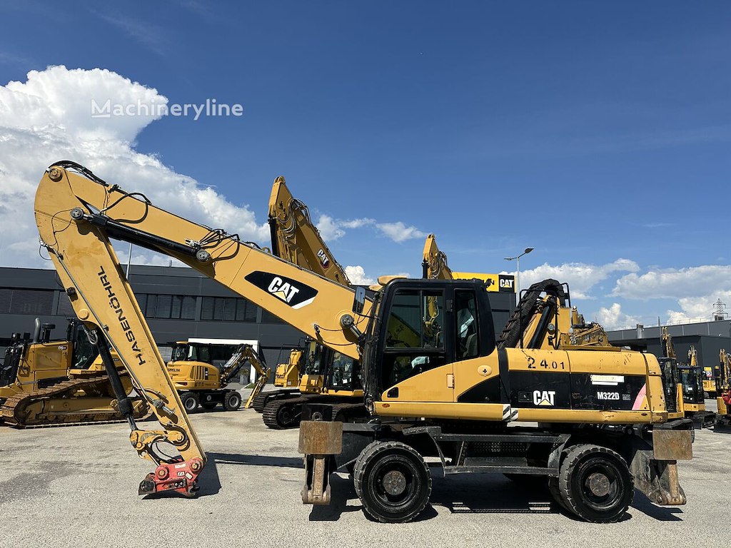 Caterpillar M322D bager za pretovar