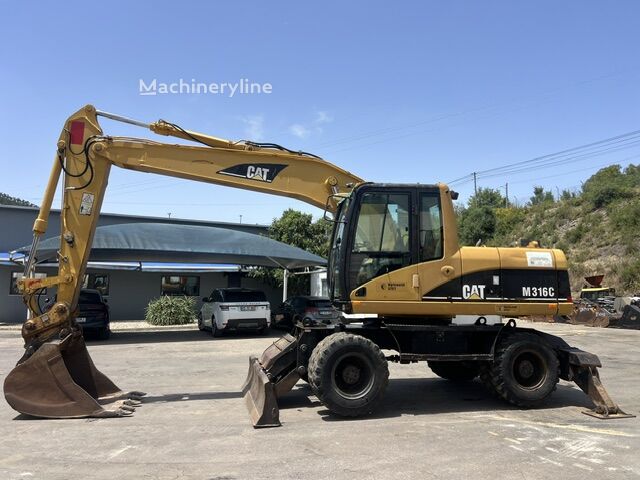 Caterpillar M316C bager točkaš