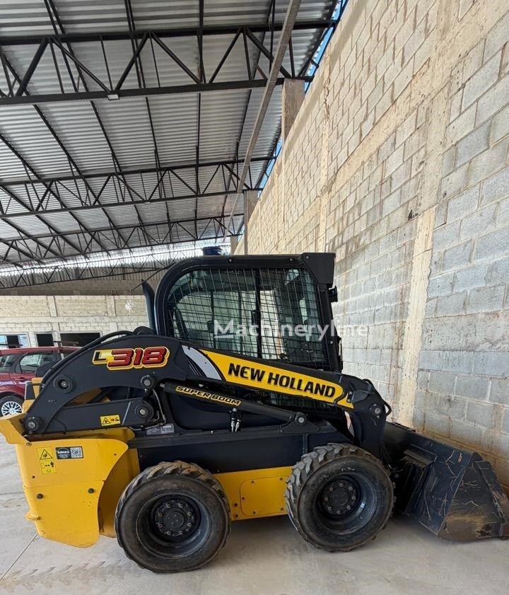 New Holland L 318 mini utovarivač