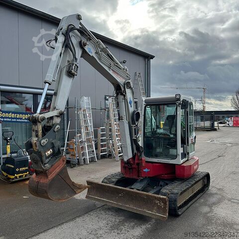 Mini bager
Takeuchi TB 153 FR
