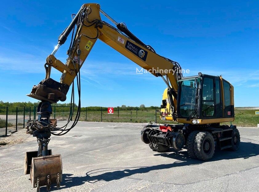 Caterpillar M315F ROAD-RAIL UNAC 22 TRR bager na šinama